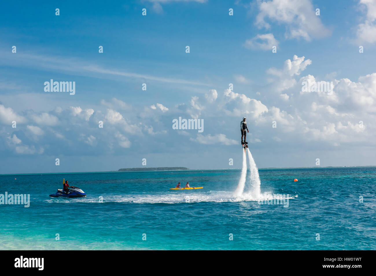 Maldives, Rangali Island. Conrad Hilton Resort. Man on jet blade Stock ...