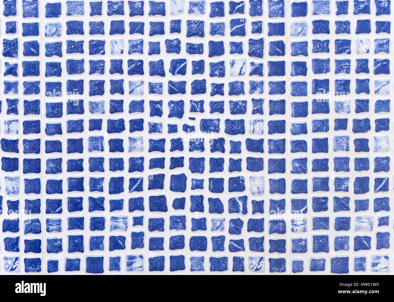 Wall with small blue mosaic stones Stock Photo - Alamy