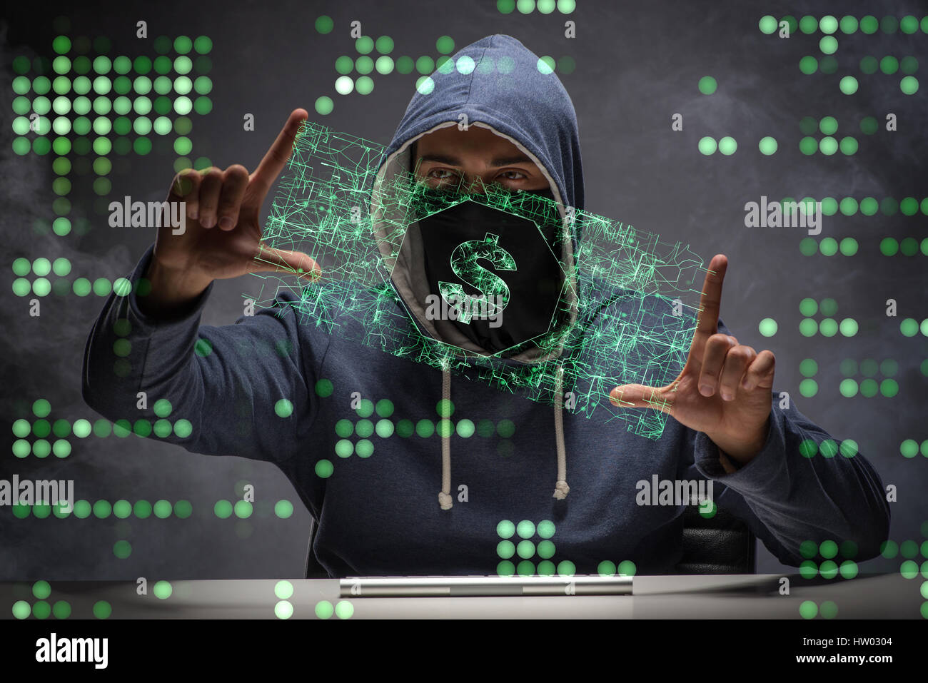 Hacker stealing dollars from bank Stock Photo - Alamy
