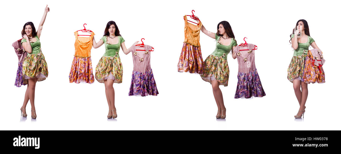 Woman trying to choose dress on white Stock Photo - Alamy