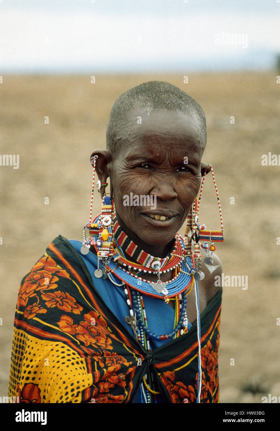 Masai woman wearing traditional colourful beadwork. Elder married lady ...
