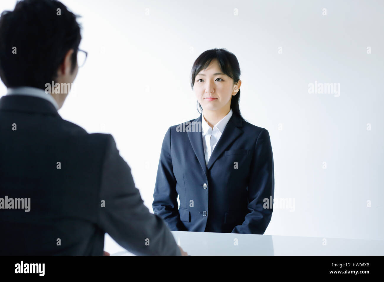 Japanese young woman undergoing job interview Stock Photo - Alamy