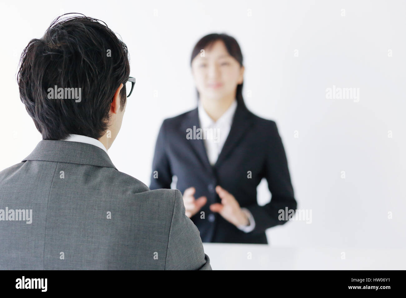 Japanese young woman undergoing job interview Stock Photo - Alamy