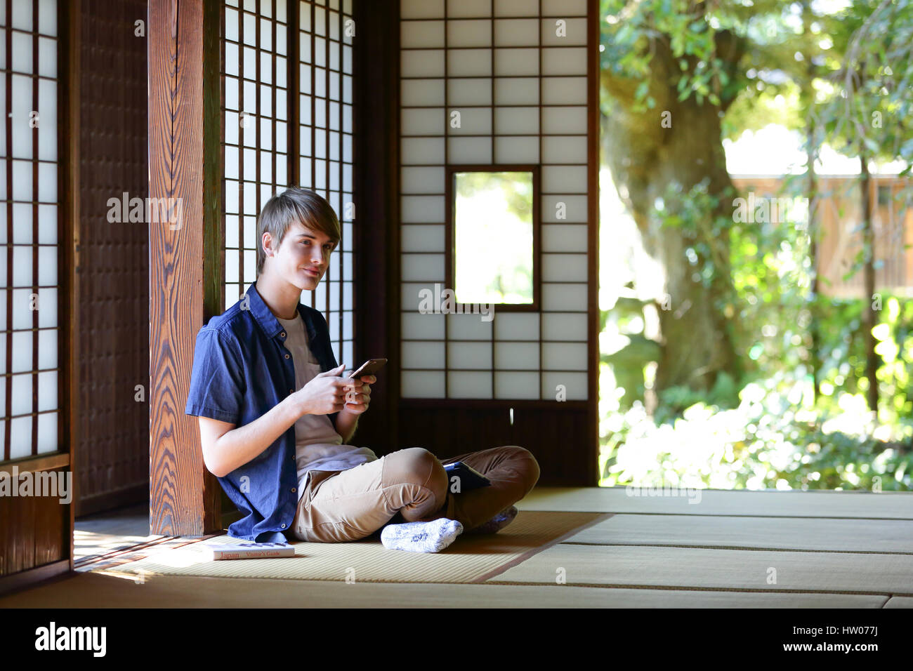 Caucasian man in traditional Japanese house Stock Photo - Alamy