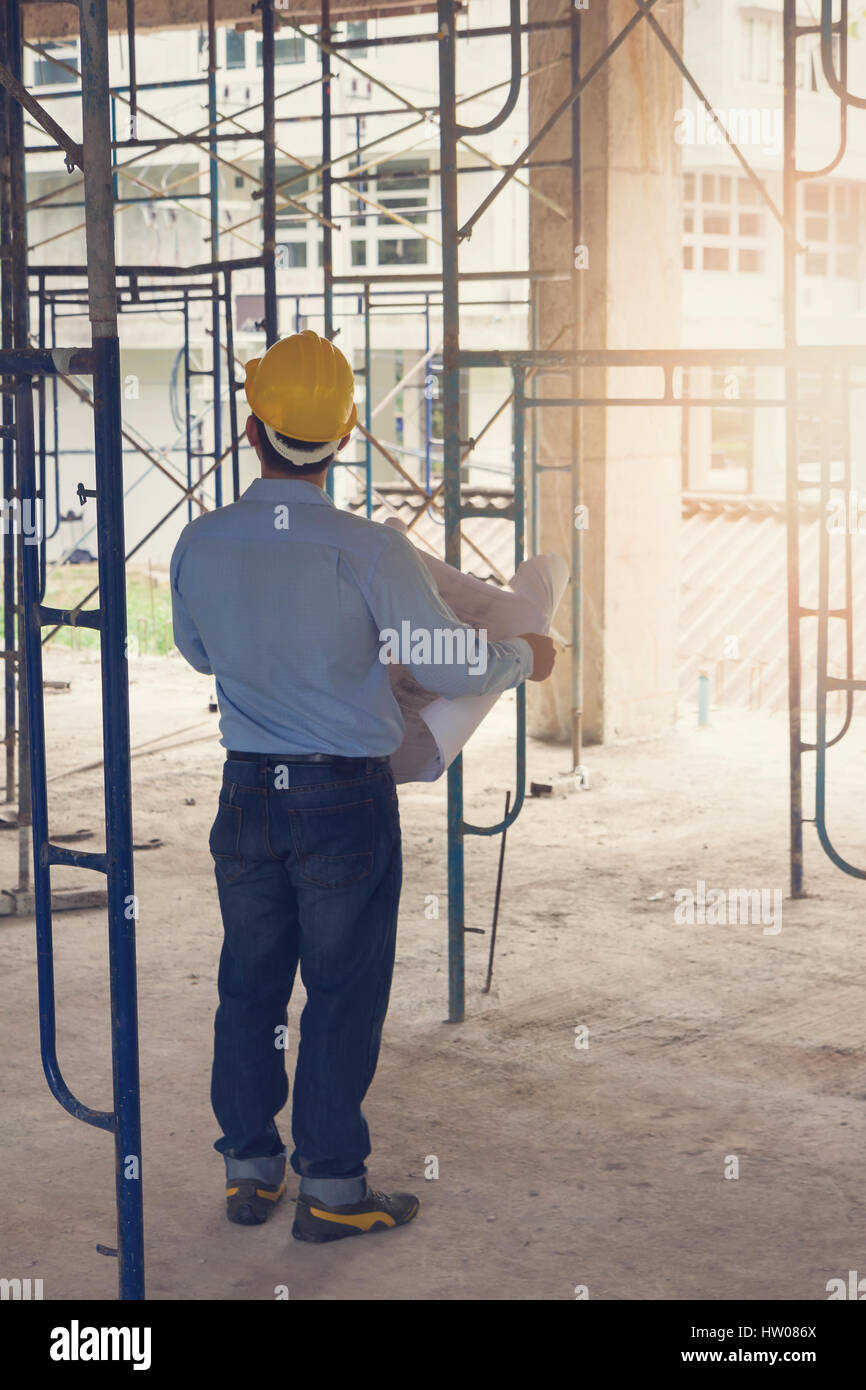 Engineer Architect working at Construction Site, Vintage Effect Stock ...