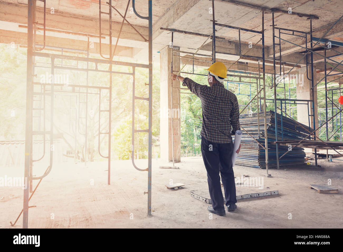 Engineer Architect working at Construction Site, Vintage Effect Stock ...