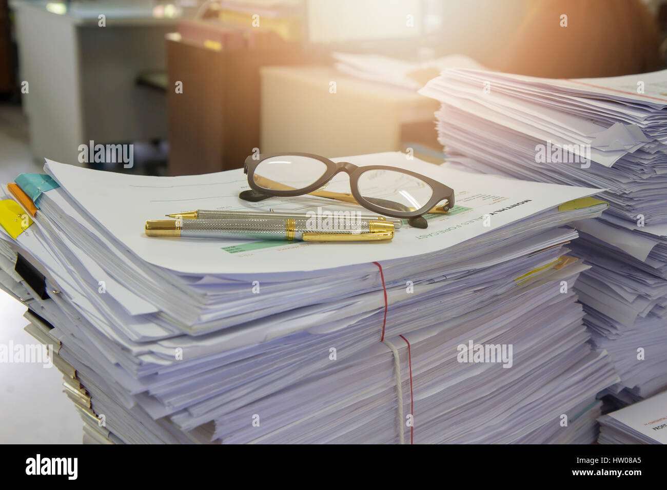Business Concept, Pile of unfinished documents on office desk, Stack of ...