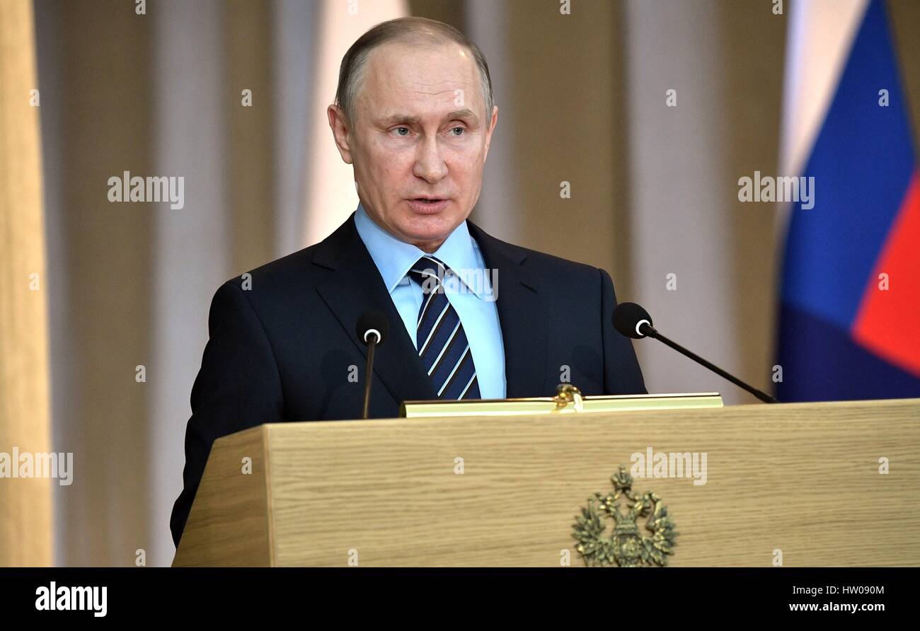 Russian President Vladimir Putin addresses members during a meeting of ...