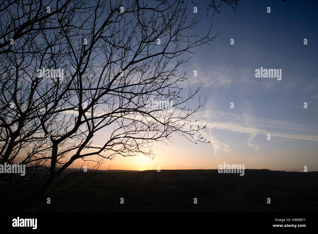 Halifax, UK. 15th Mar, 2017. UK Weather. The sun sets at the end of a ...