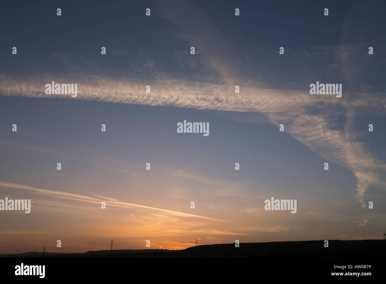 Halifax, UK. 15th Mar, 2017. UK Weather. The sun sets at the end of a ...