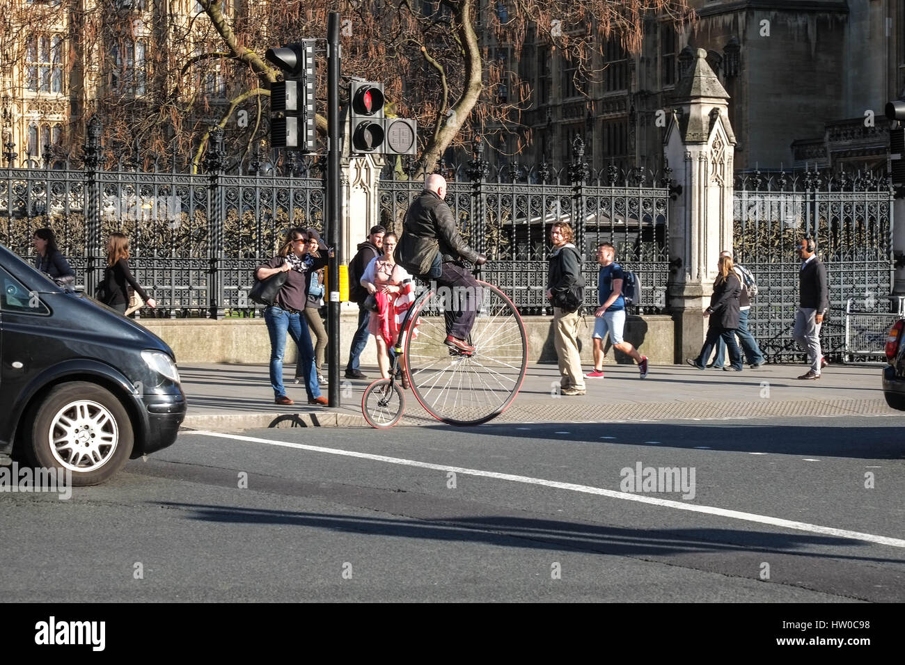 London, UK. 15th March, 2017. Man riding a Penny Farthing outside ...