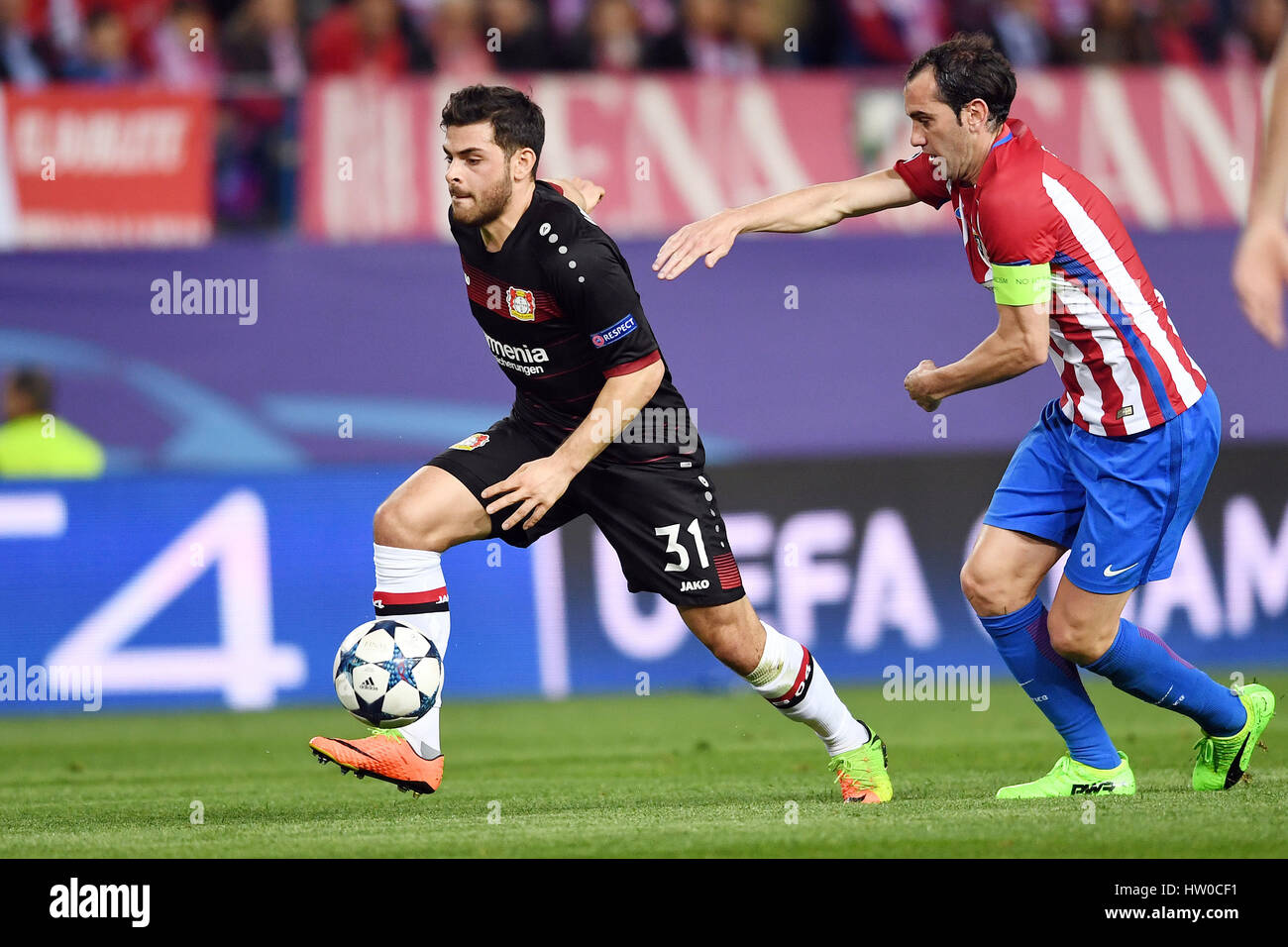 Madrid, Spain. 15th Mar, 2017. Madrid's Diego Godin (r) and Kevin ...