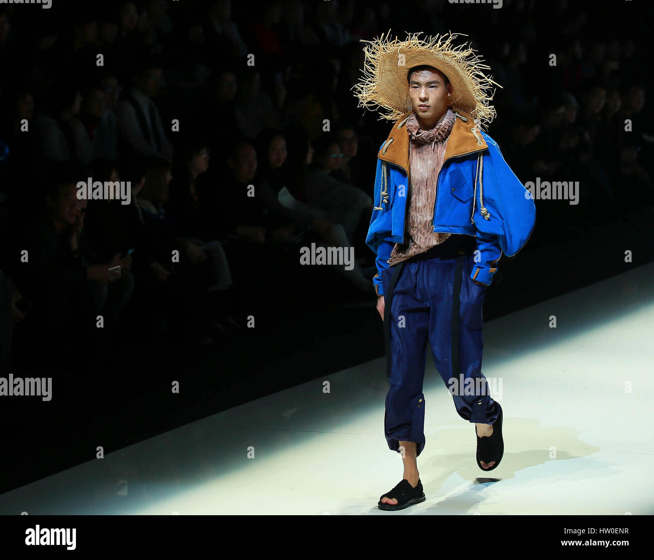 Beijing, China. 15th Mar, 2017. A model presents a fashion design ...