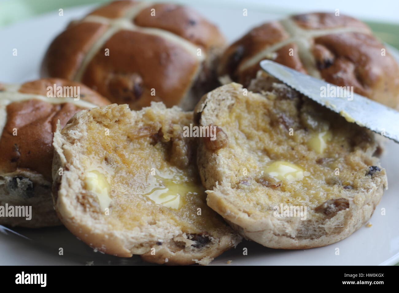 n 12th century an Anglican monk baked the buns and marked them with a ...