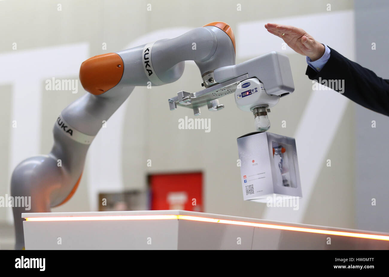 Augsburg, Germany. 22nd Mar, 2017. A Kuka robot can be seen moving a ...