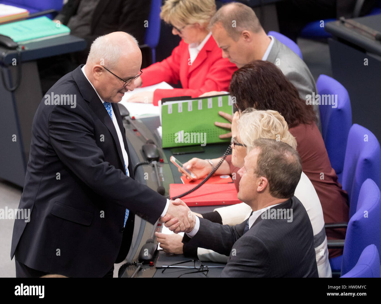The faction leader of the CDU/CSU, Volker Kauder (L) greets the faction ...
