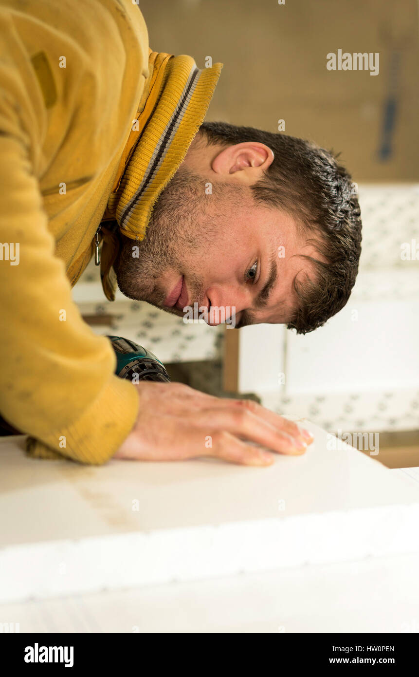 Work in the workshop hi-res stock photography and images - Alamy