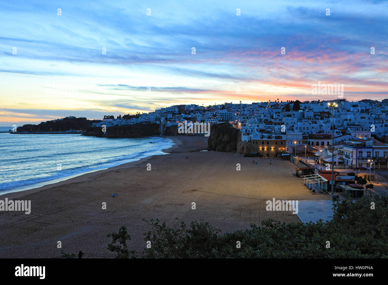 The beach in Albufeira, Portugal at sunset Stock Photo - Alamy