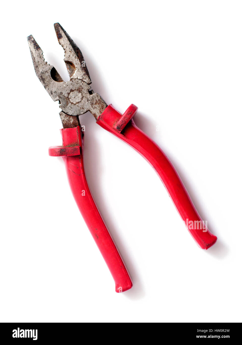 Pilers with red grips - isolated on white Stock Photo - Alamy