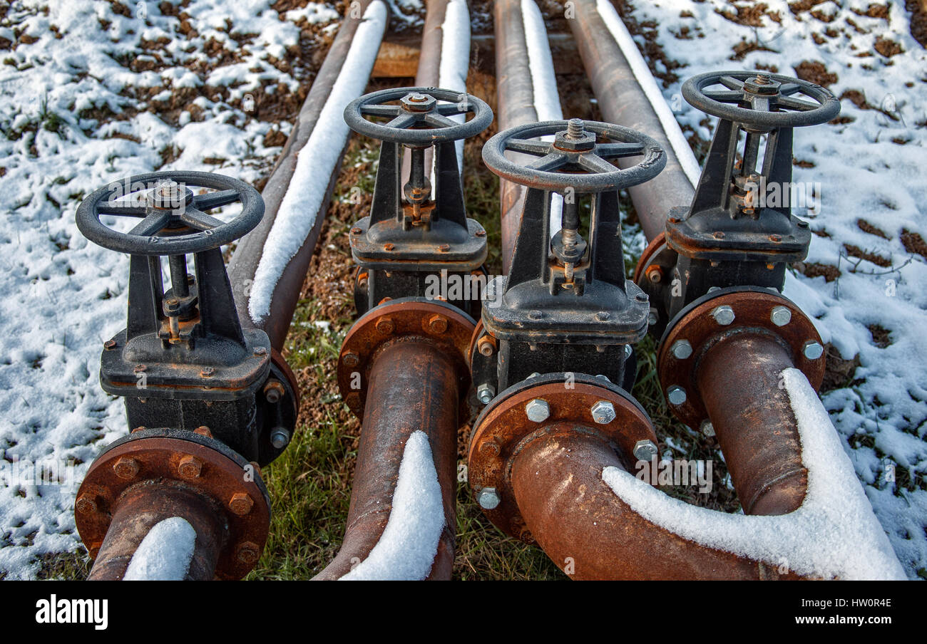 steel pipes and valves on industrial enterprise Stock Photo - Alamy