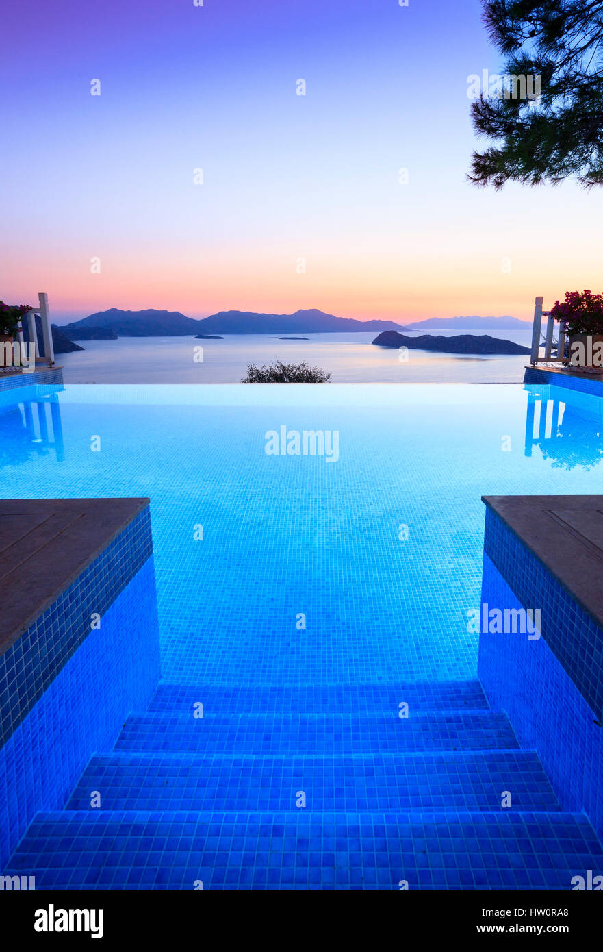 Infinity pool with view of Symi, Sogut, Turkey Stock Photo - Alamy
