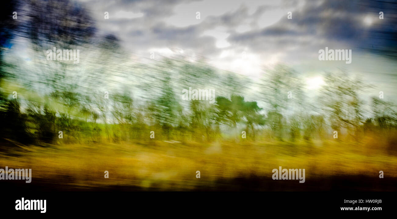 Landscape from a moving train Stock Photo - Alamy