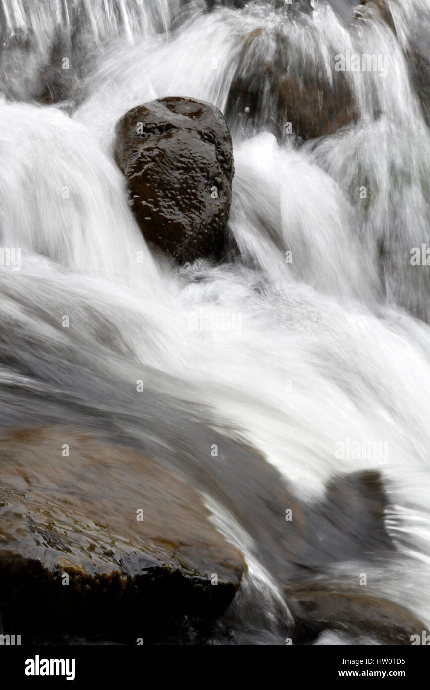 Fast flowing mountain stream and rocks Stock Photo - Alamy