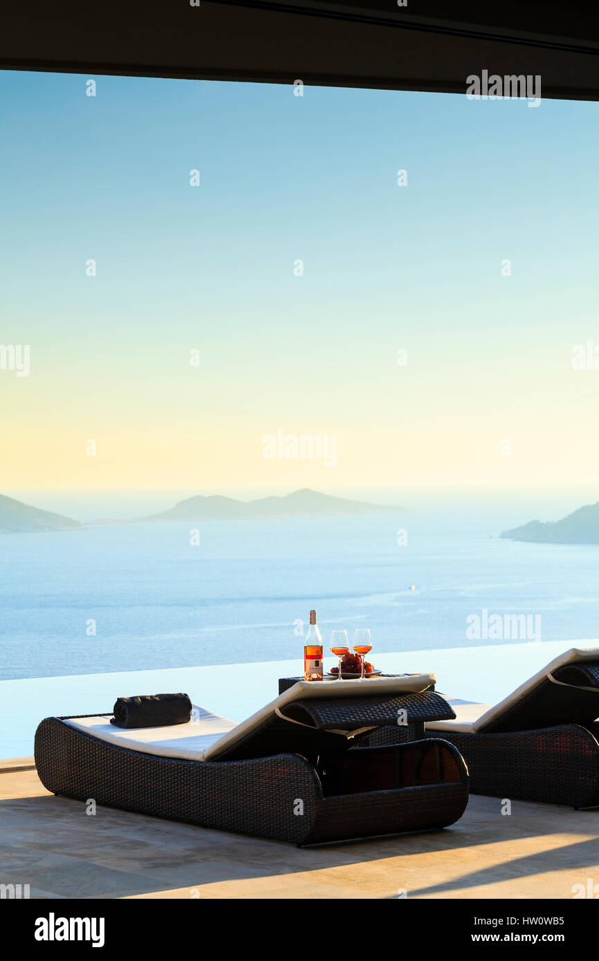 Kalkan sunset with infinity pool, Turkey Stock Photo - Alamy