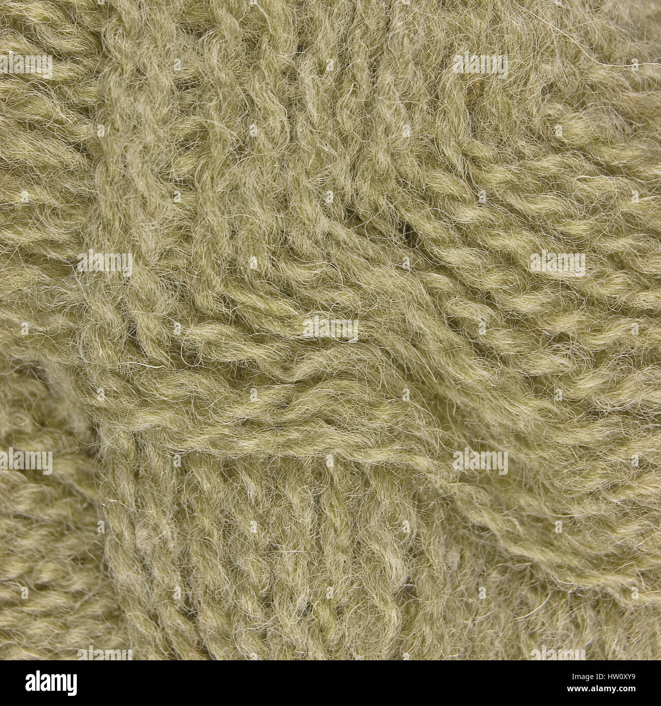 Natural beige fine wool threads texture, clew yarn macro closeup ...
