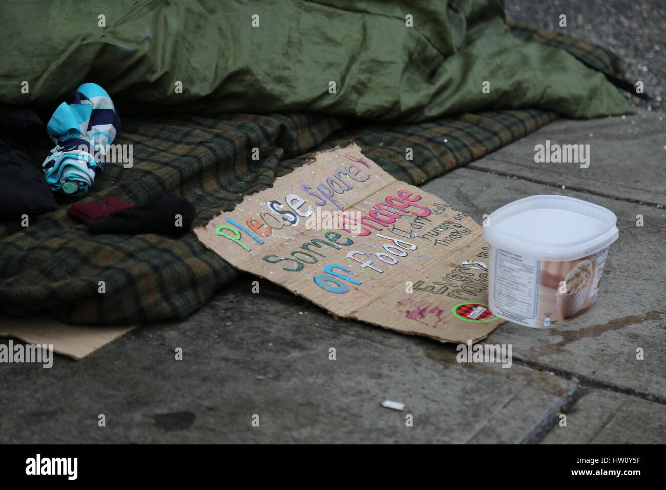 Handwritten paper asking for handout Stock Photo - Alamy