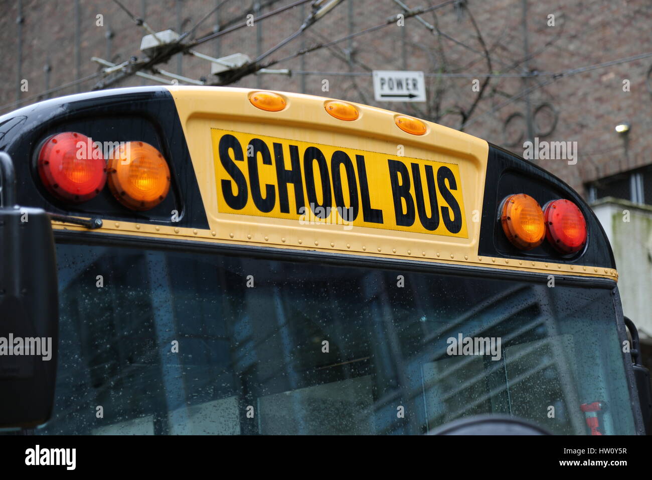 Yellow school bus front sign lights Stock Photo - Alamy
