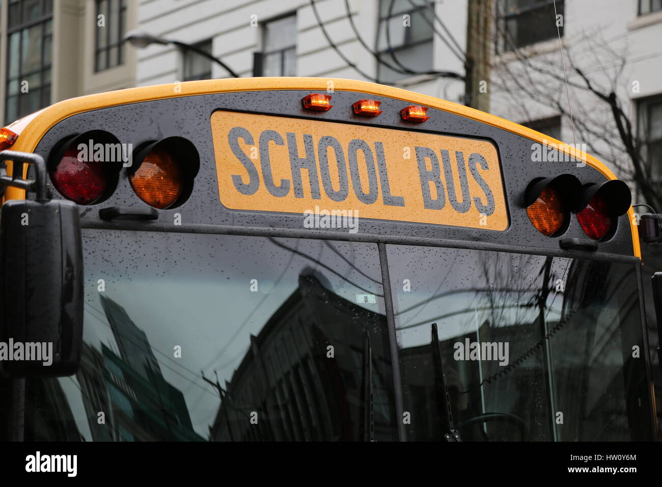 Yellow school bus front sign lights Stock Photo - Alamy