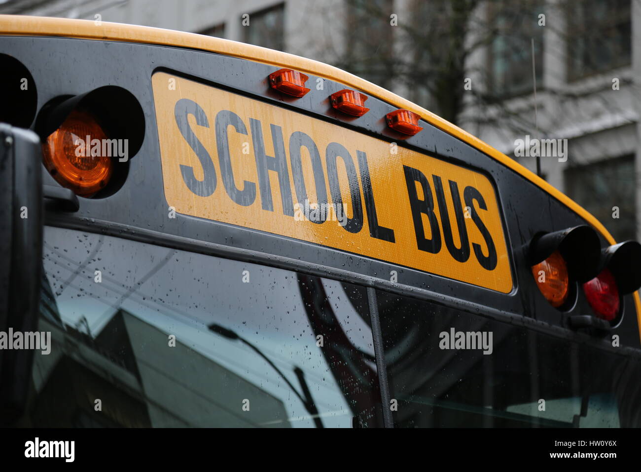 Yellow school bus front sign lights Stock Photo - Alamy