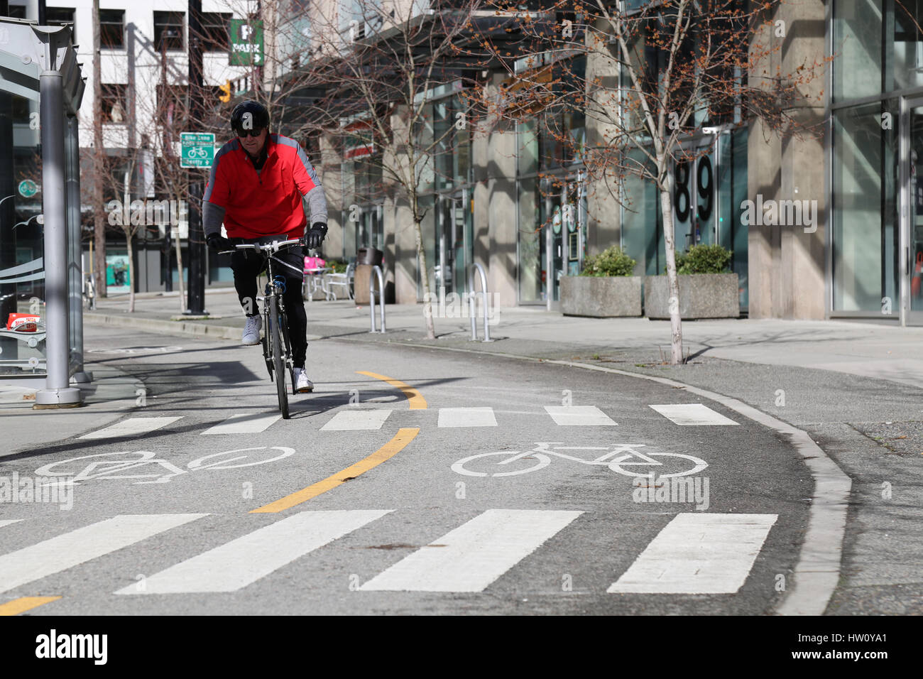 Man riding bicycle riding outdoor Stock Photo - Alamy
