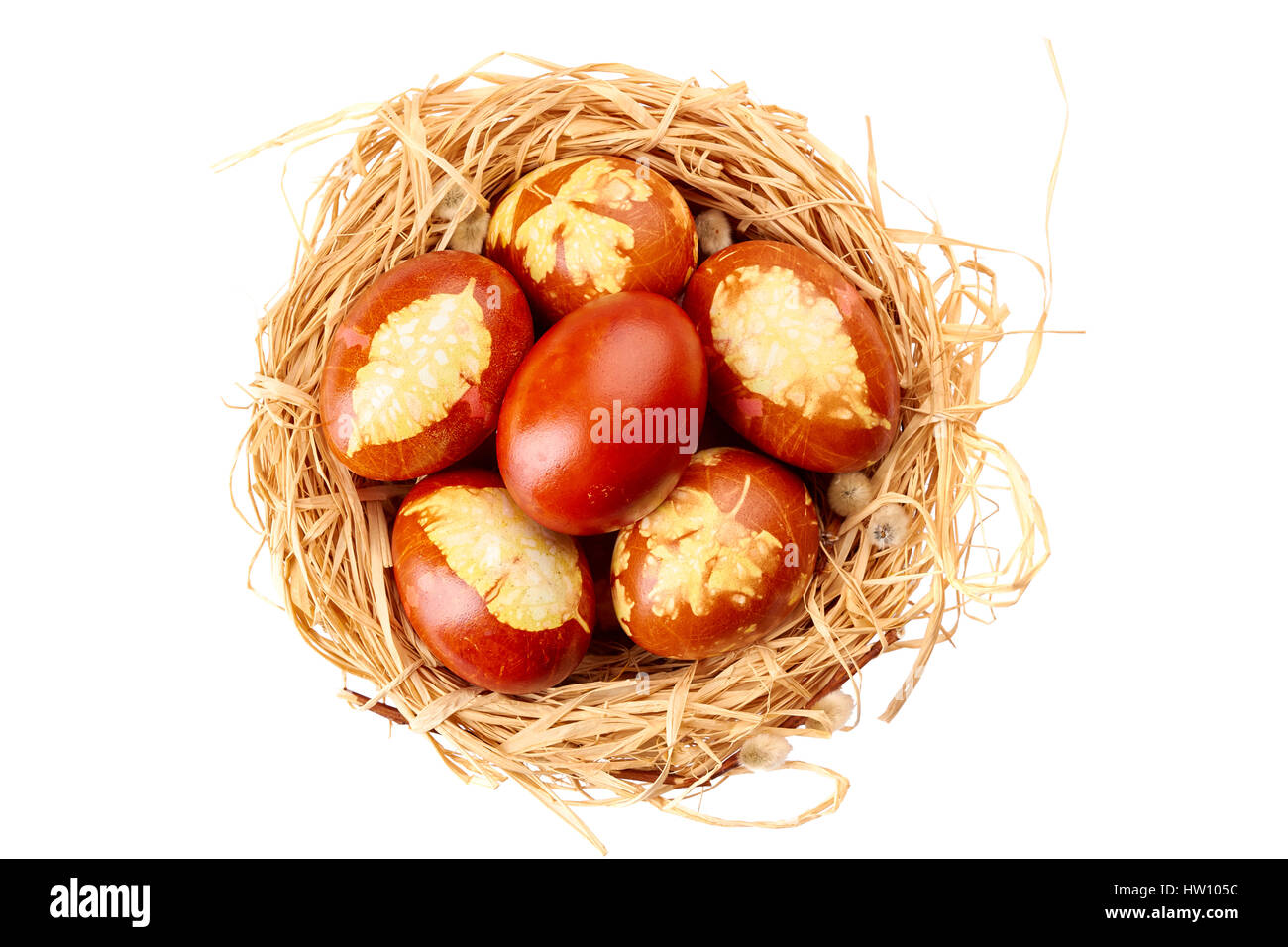 Colorful decorated easter eggs in small wicker baket on white Stock ...