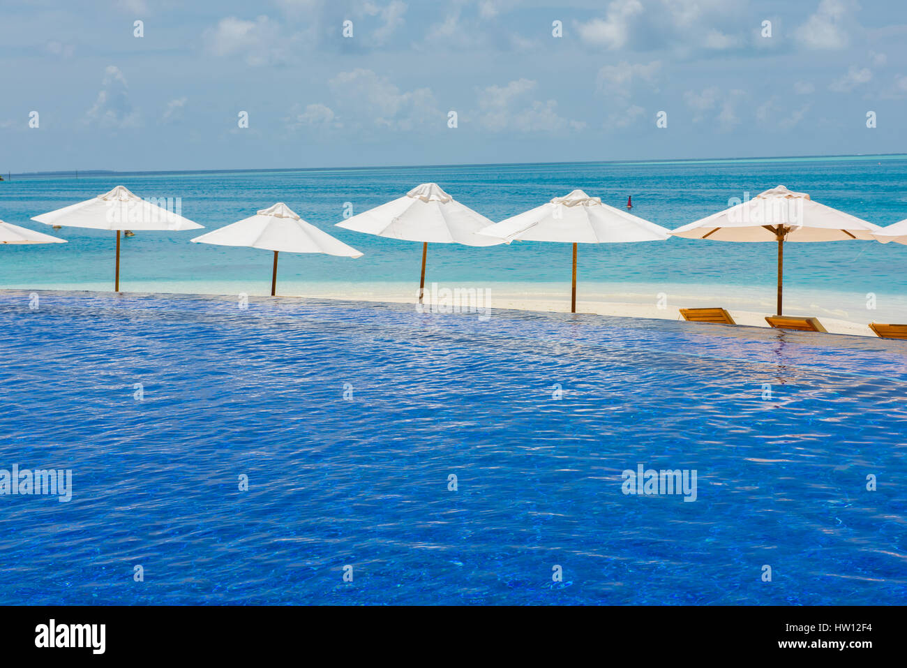 Maldives, Rangali Island. Conrad Hilton Resort. Pool near the beach ...