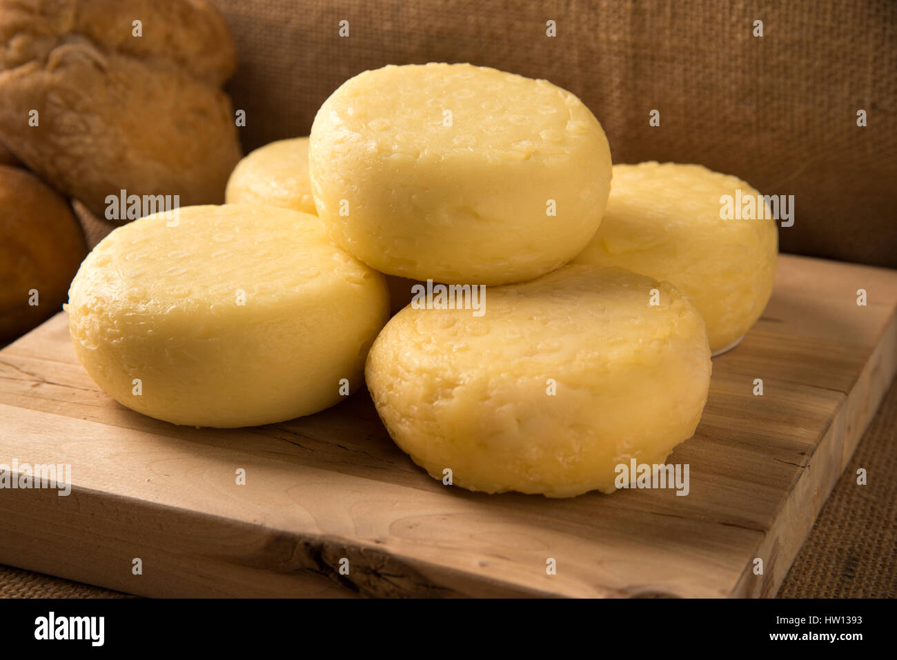 cheese, five small gourmet artisanal cheeses on wood board Stock Photo ...