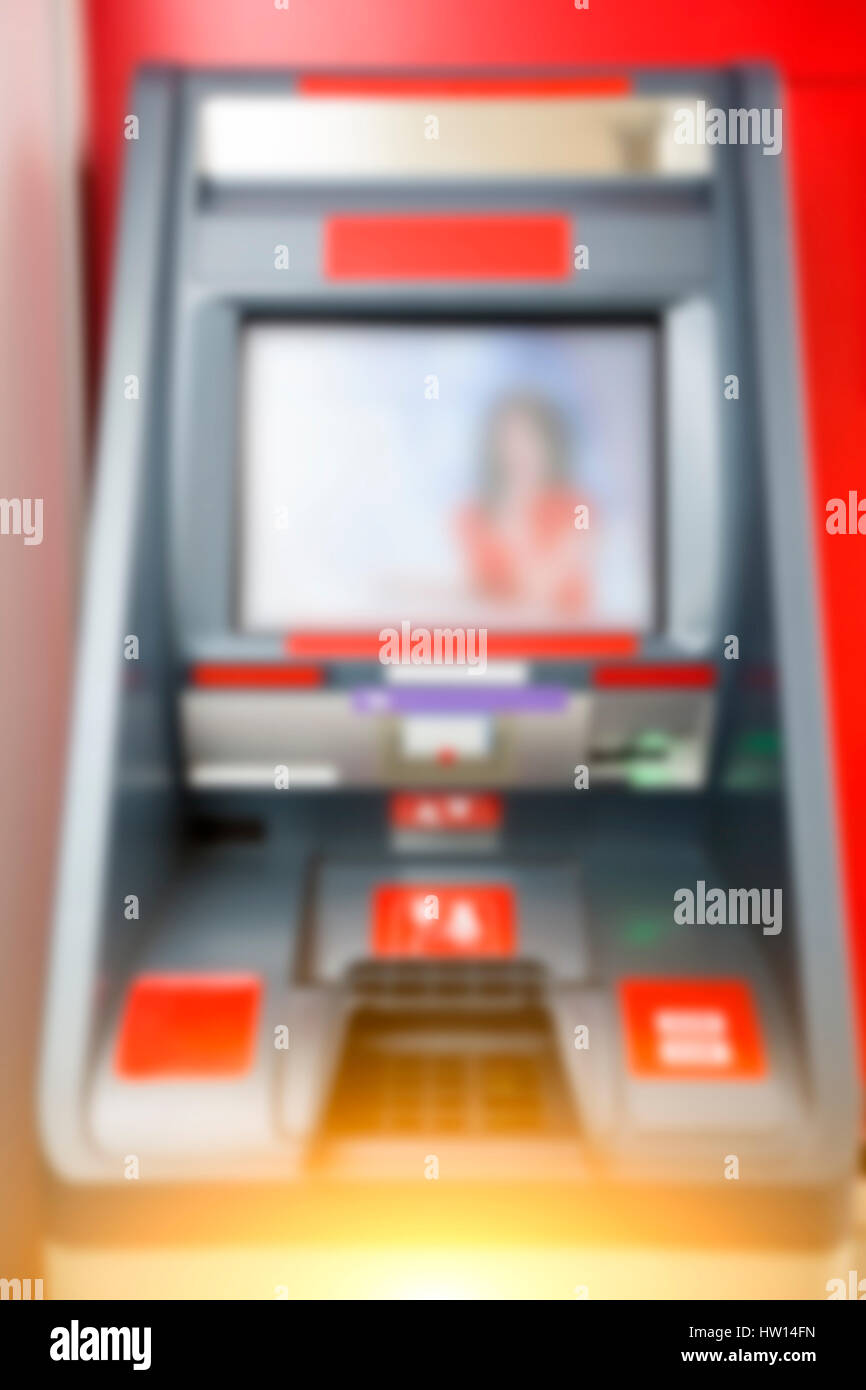 Photo of red cash dispenser Stock Photo - Alamy