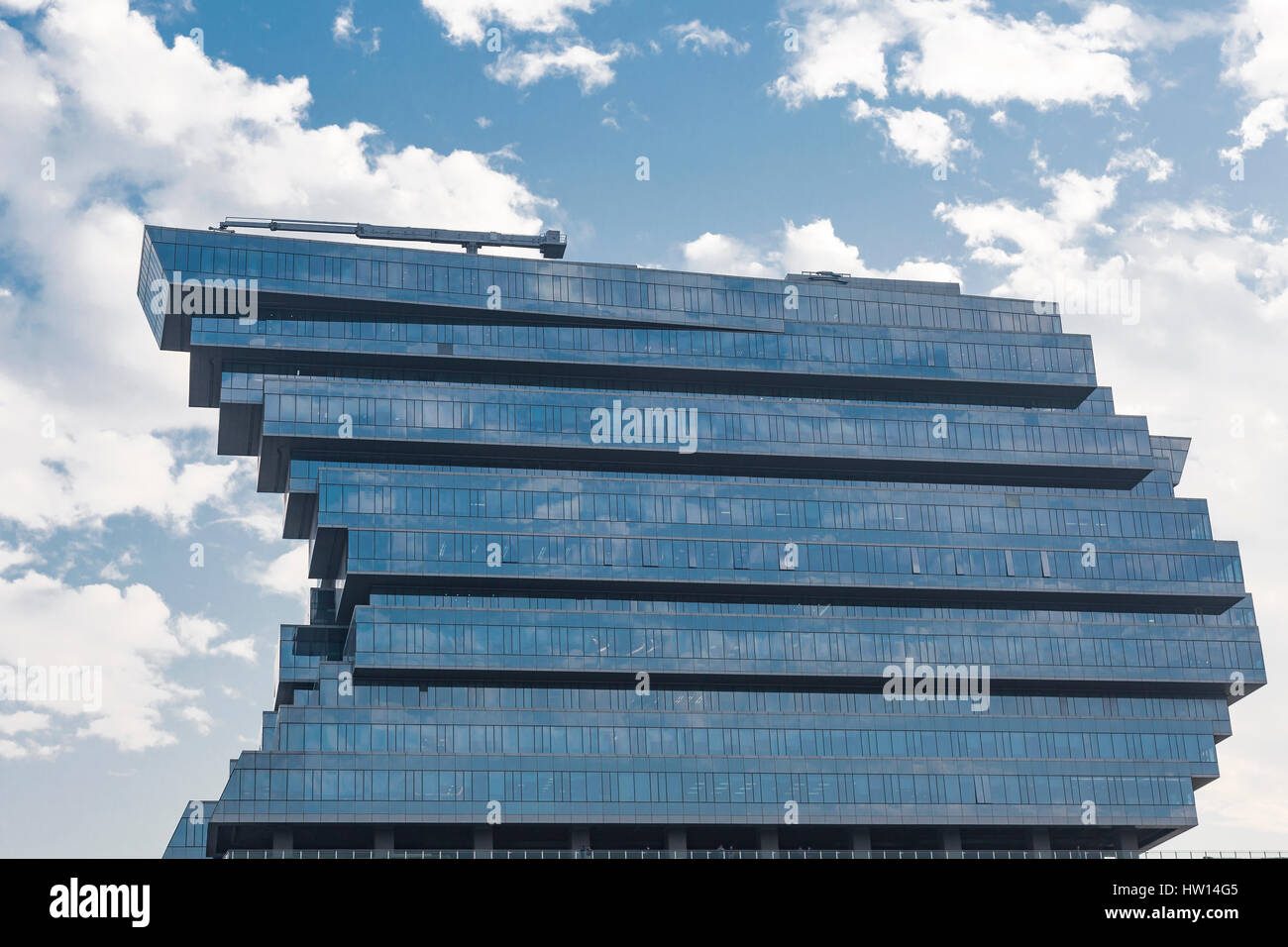 Abstract building in Guangzhou with sky and clouds background, China ...