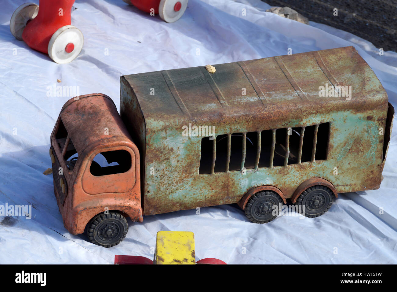 Old rusty toy for in the form of the truck Stock Photo - Alamy
