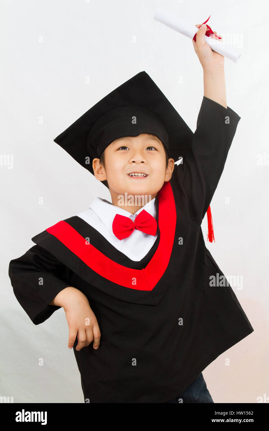 Chinese little boy graduation in white backround studio shot Stock ...