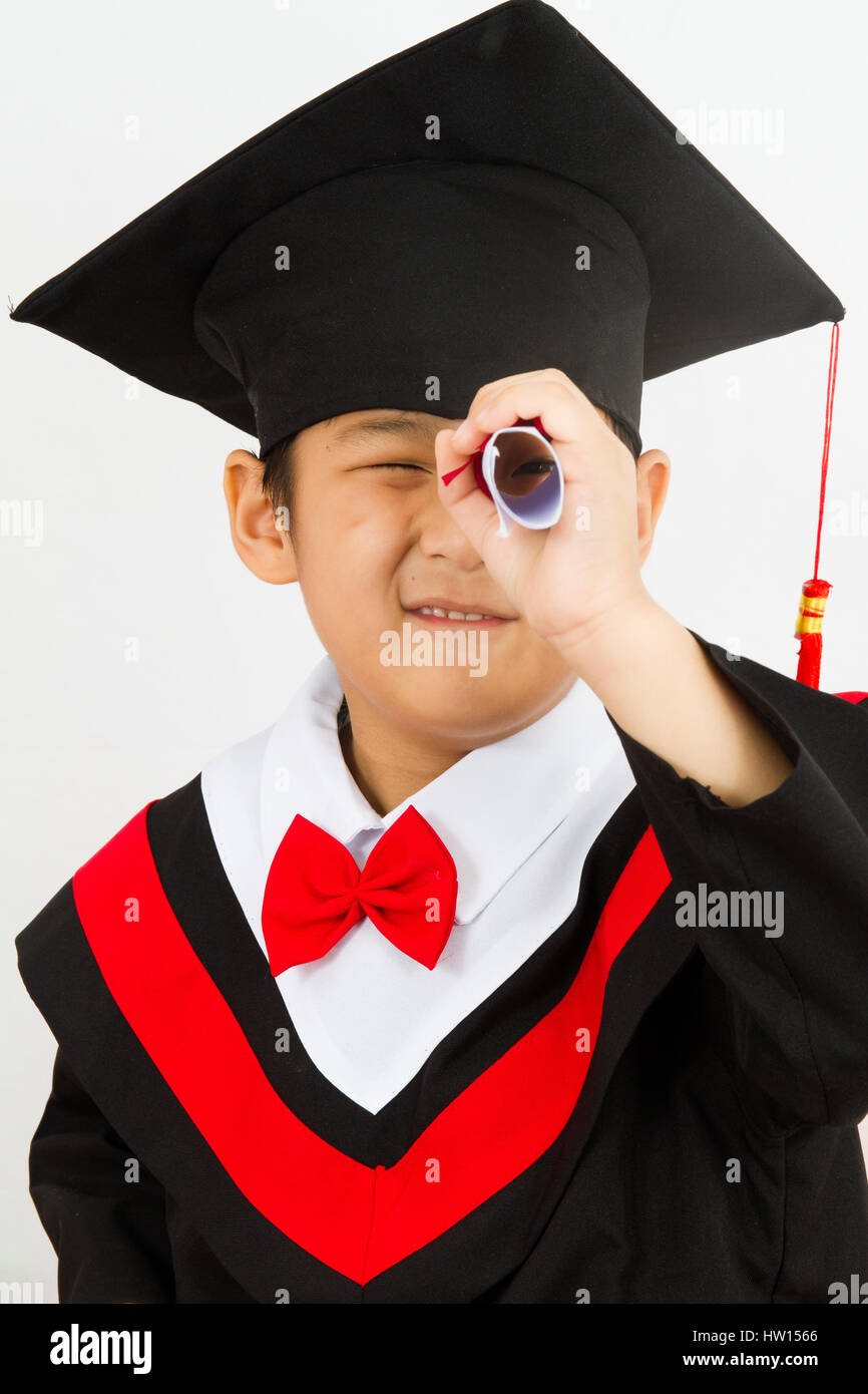 Chinese little boy graduation in white backround studio shot Stock ...