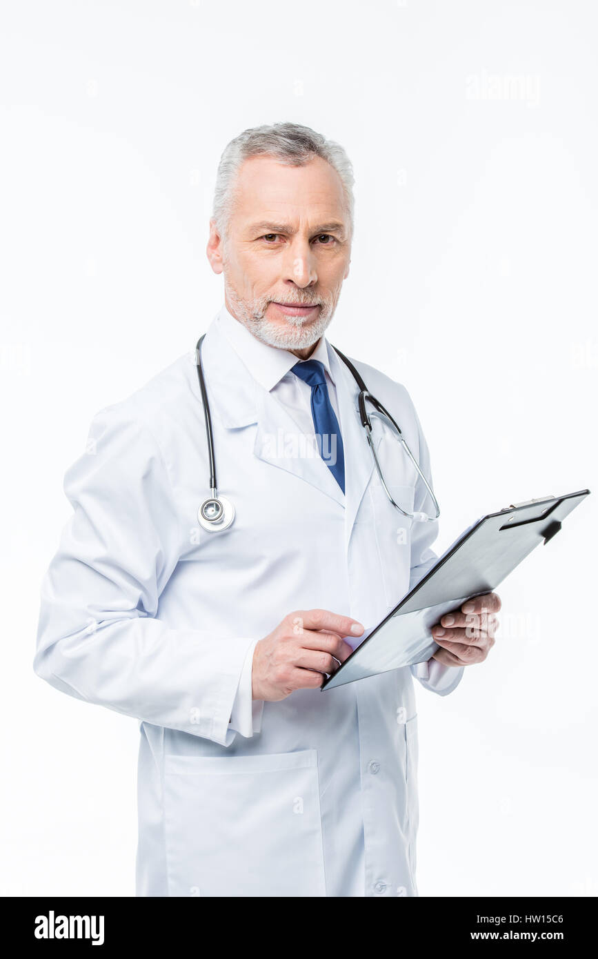 Doctor holding clipboard Stock Photo - Alamy