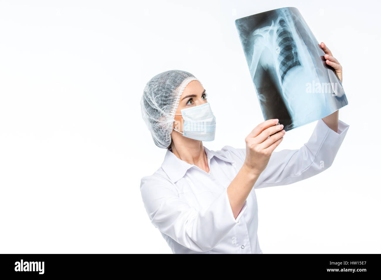 Doctor holding x-ray image Stock Photo - Alamy