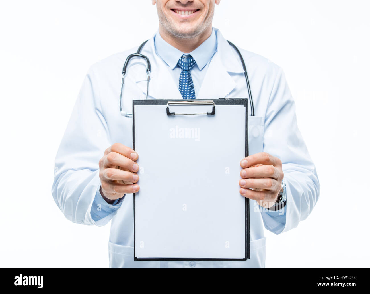 Doctor holding clipboard Stock Photo - Alamy
