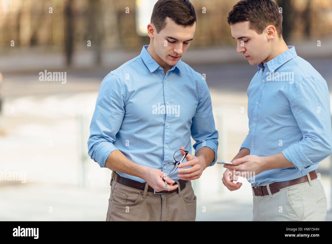 Two businessman talking about business with blur background Stock Photo ...