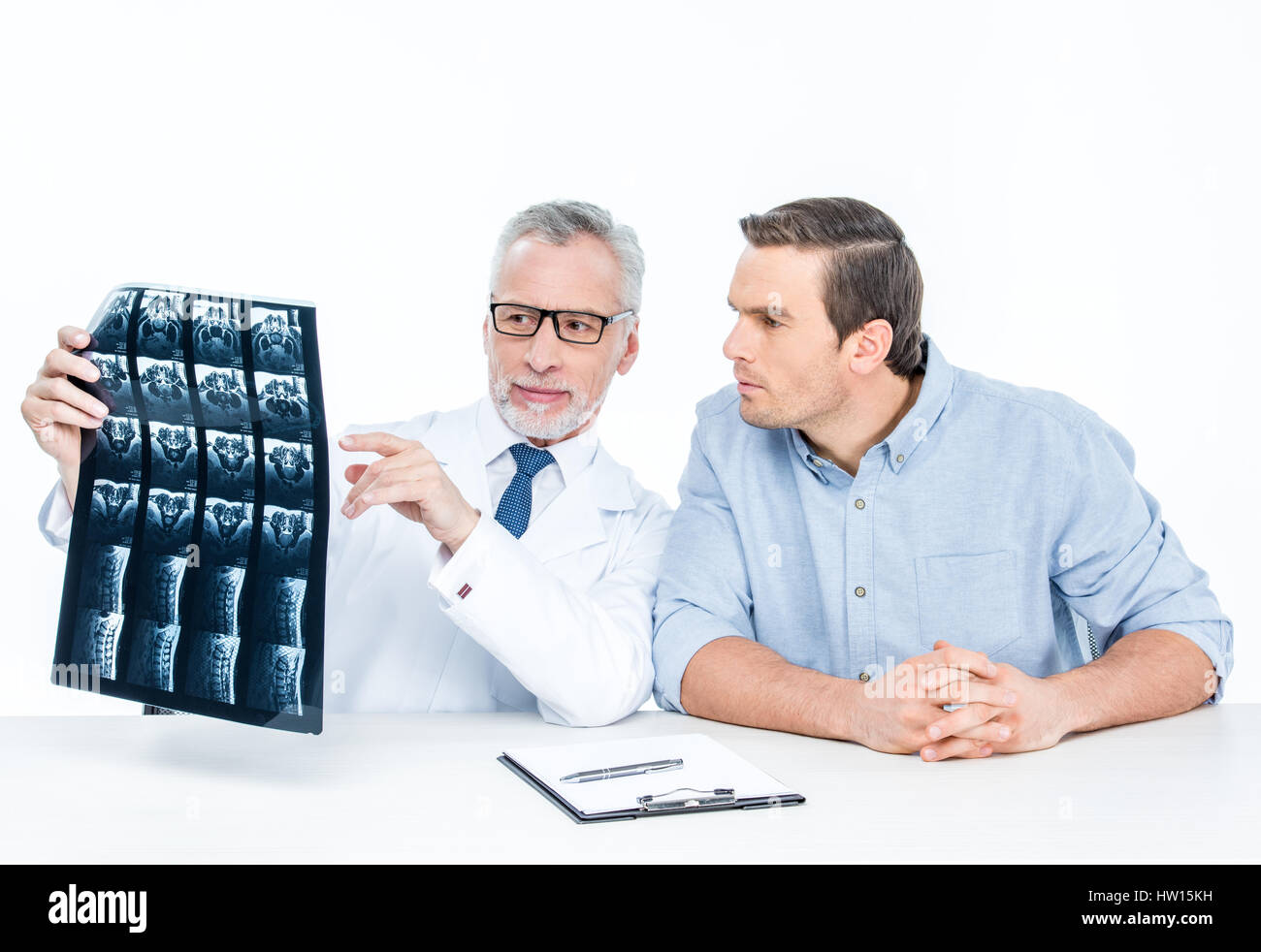 Doctor pointing patient medical Cut Out Stock Images & Pictures - Alamy