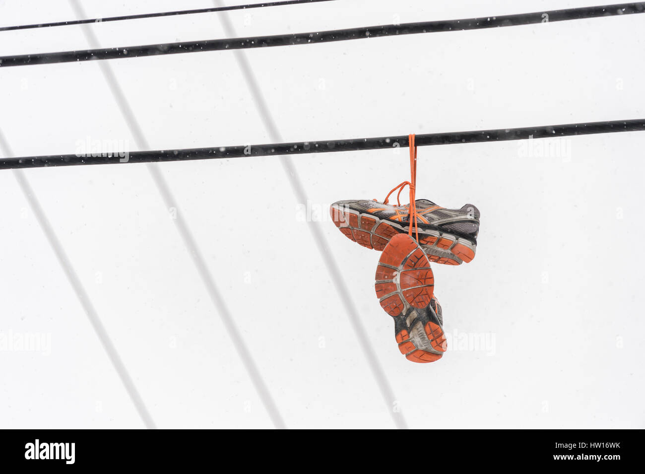 Shoe dangling hi-res stock photography and images - Alamy