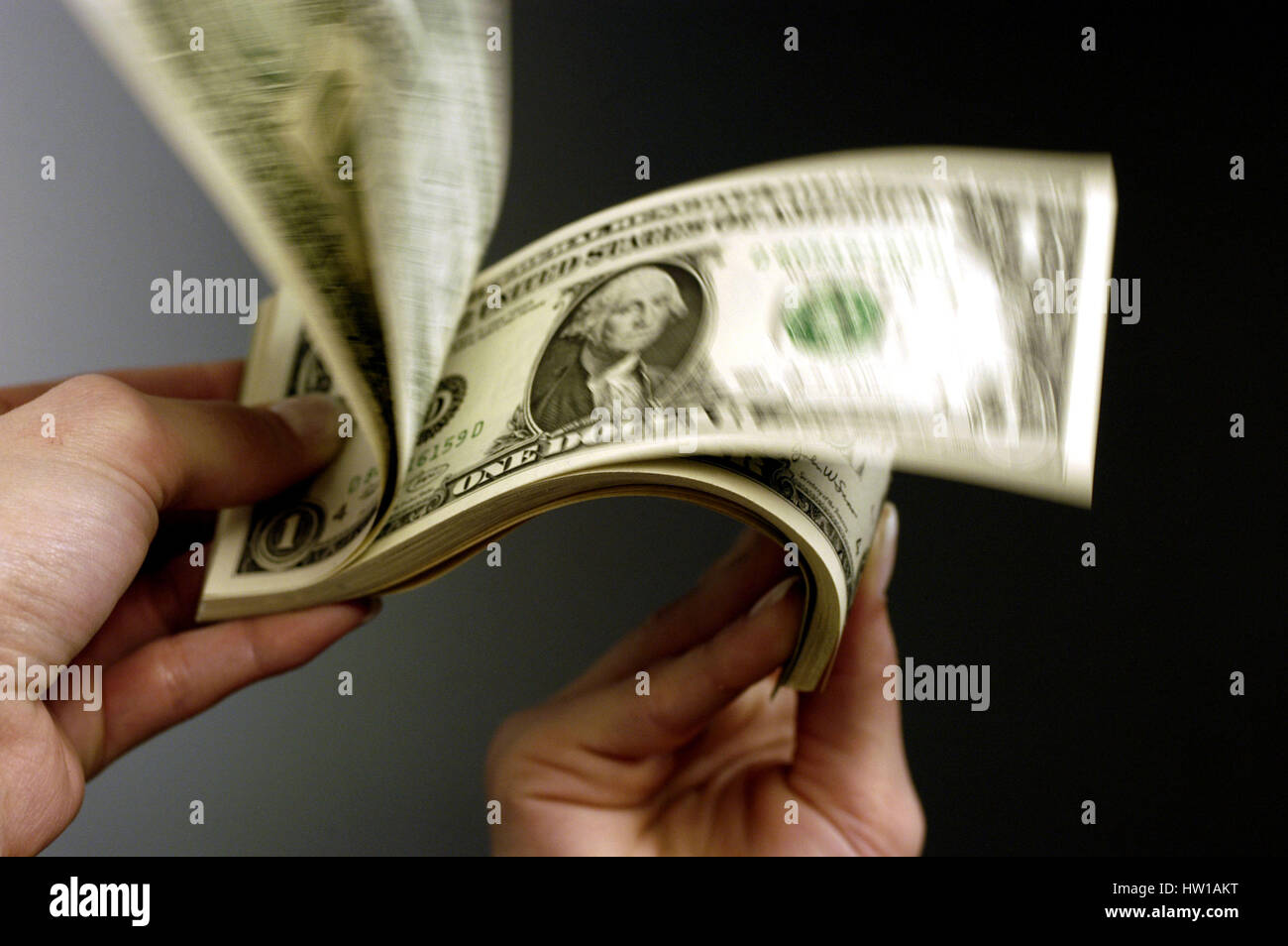 Dollar notes in the hand, Dollarscheine in der Hand Stock Photo - Alamy