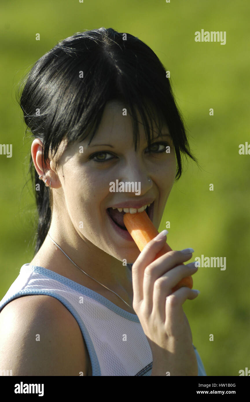 Young woman likes vegetables hi-res stock photography and images - Alamy